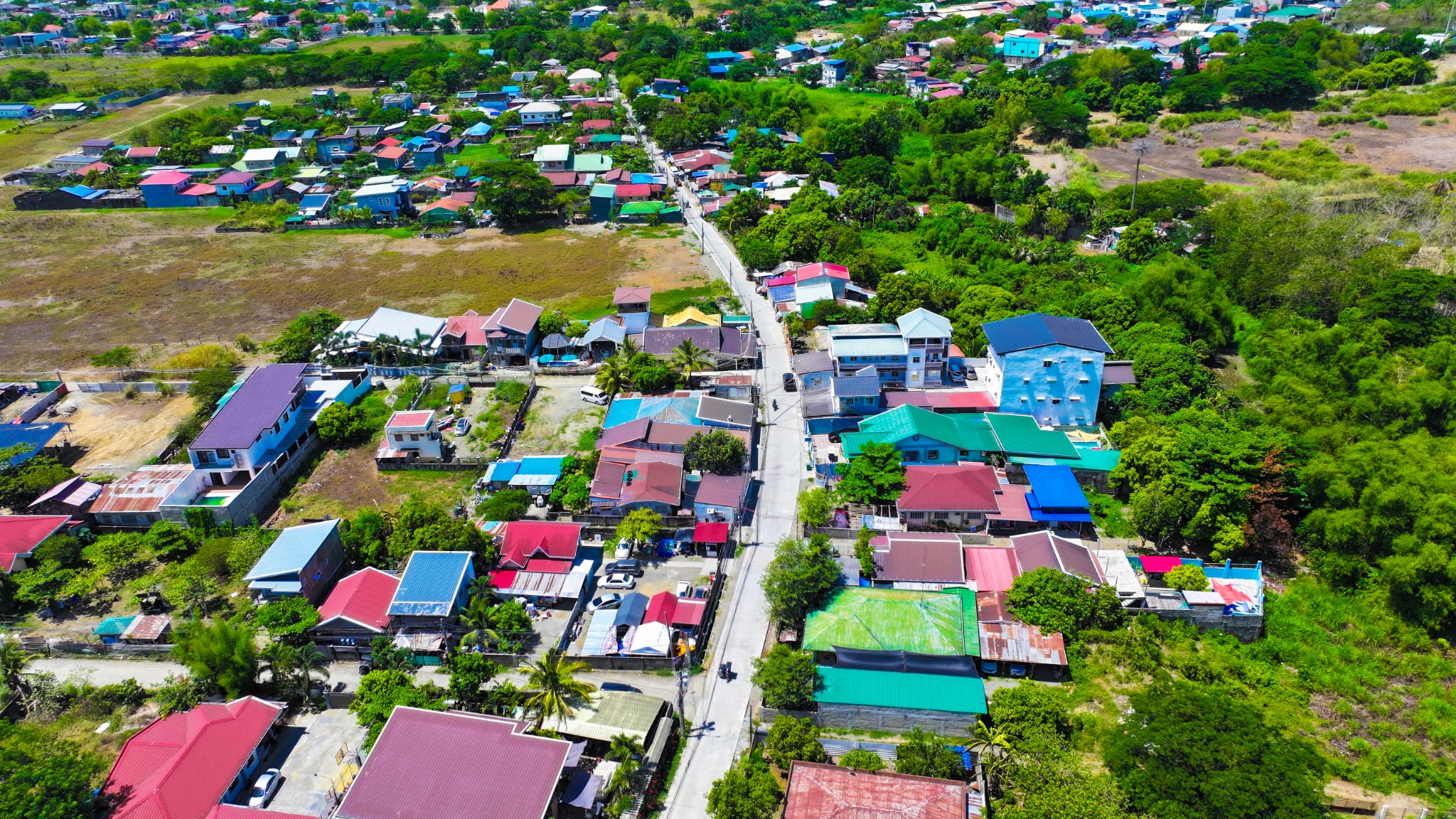 DPWH upgrades barangay road, strengthens flood control in Cabanatuan City - Punto! Central Luzon